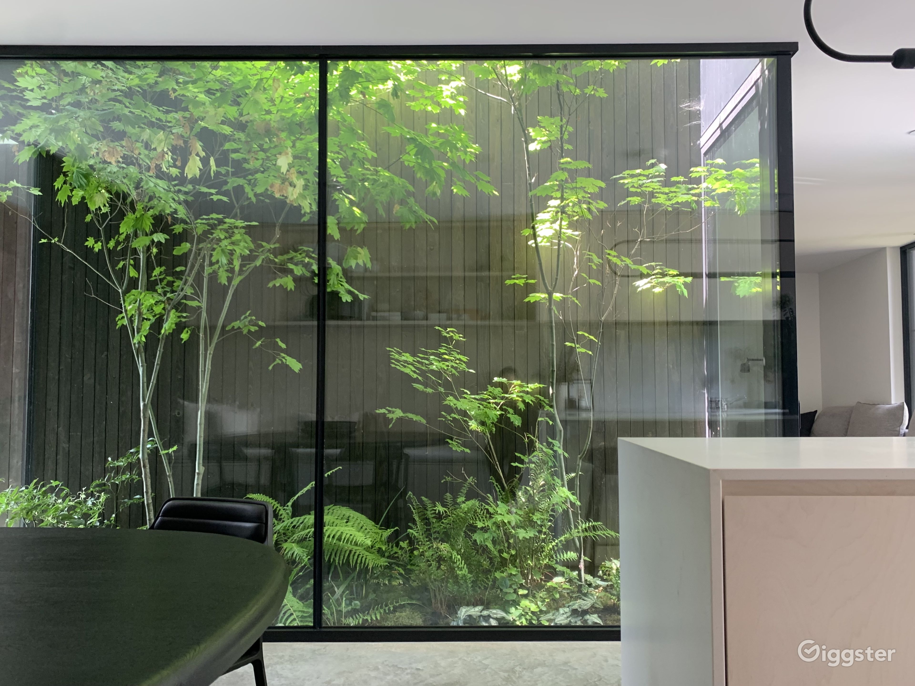Modern Home With Atrium And Roof Deck | Rent this location on Giggster