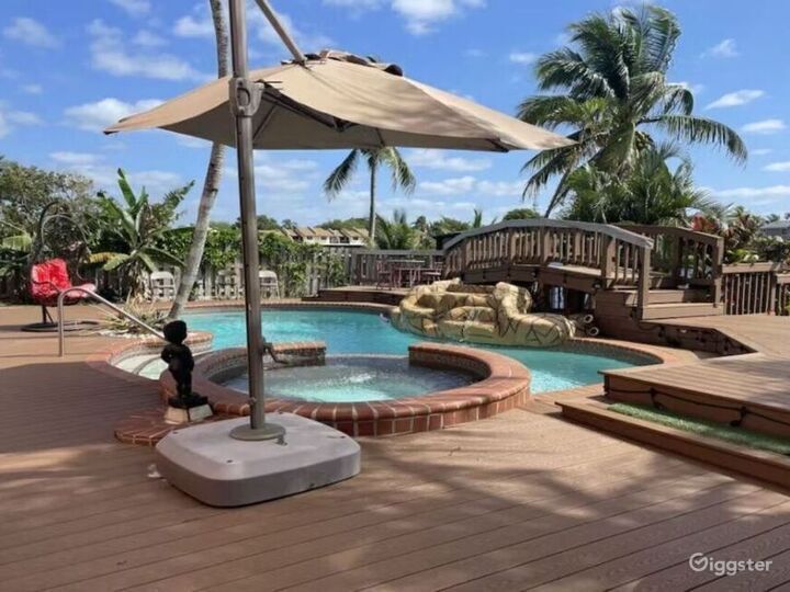 Fancy relaxation pool with lake beside | Rent this location on Giggster