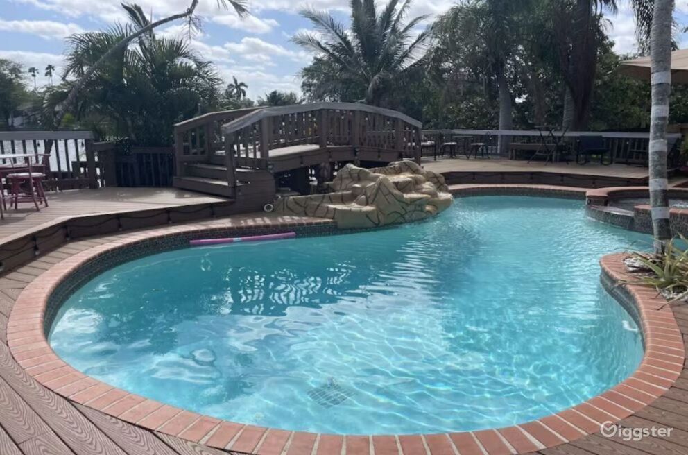 Fancy relaxation pool with lake beside | Rent this location on Giggster