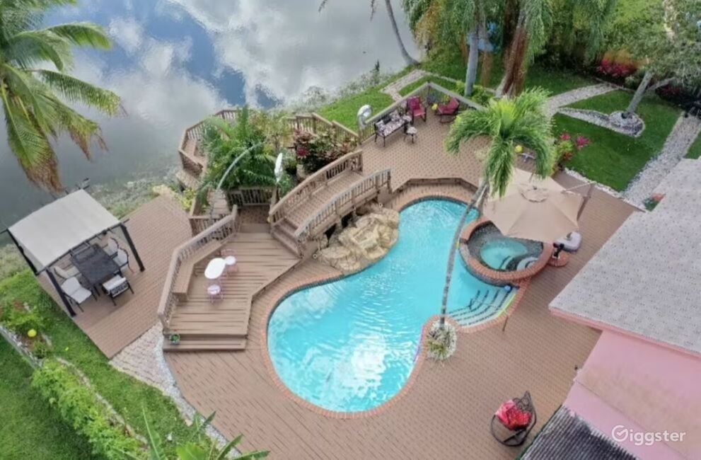 Fancy relaxation pool with lake beside | Rent this location on Giggster