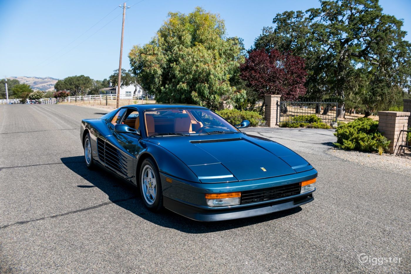 Metallic Blue Ferrari Testarossa | Rent this location on Giggster
