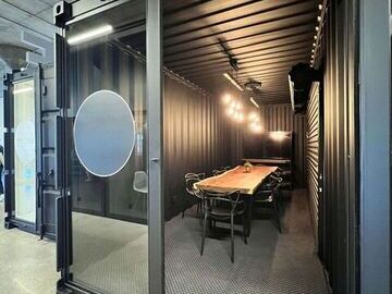 Ultra Modern Shipping Container Boardroom | Rent this location on Giggster