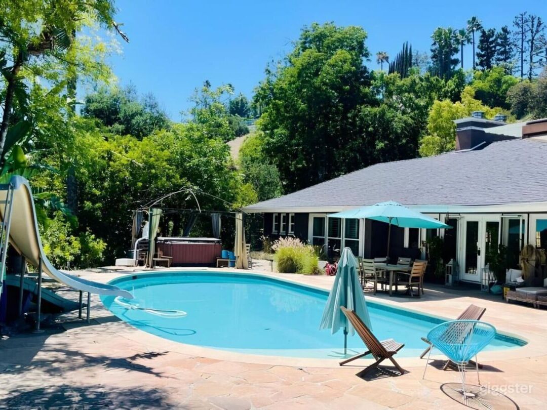 In-Ground Pool with Lounge Chairs and Shaded Areas | Rent this location ...
