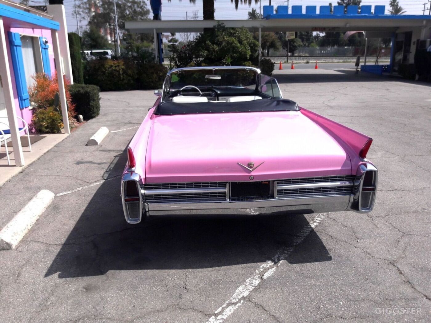 76,014 Classic Pink Convertible Cadillac | Rent this location on Giggster