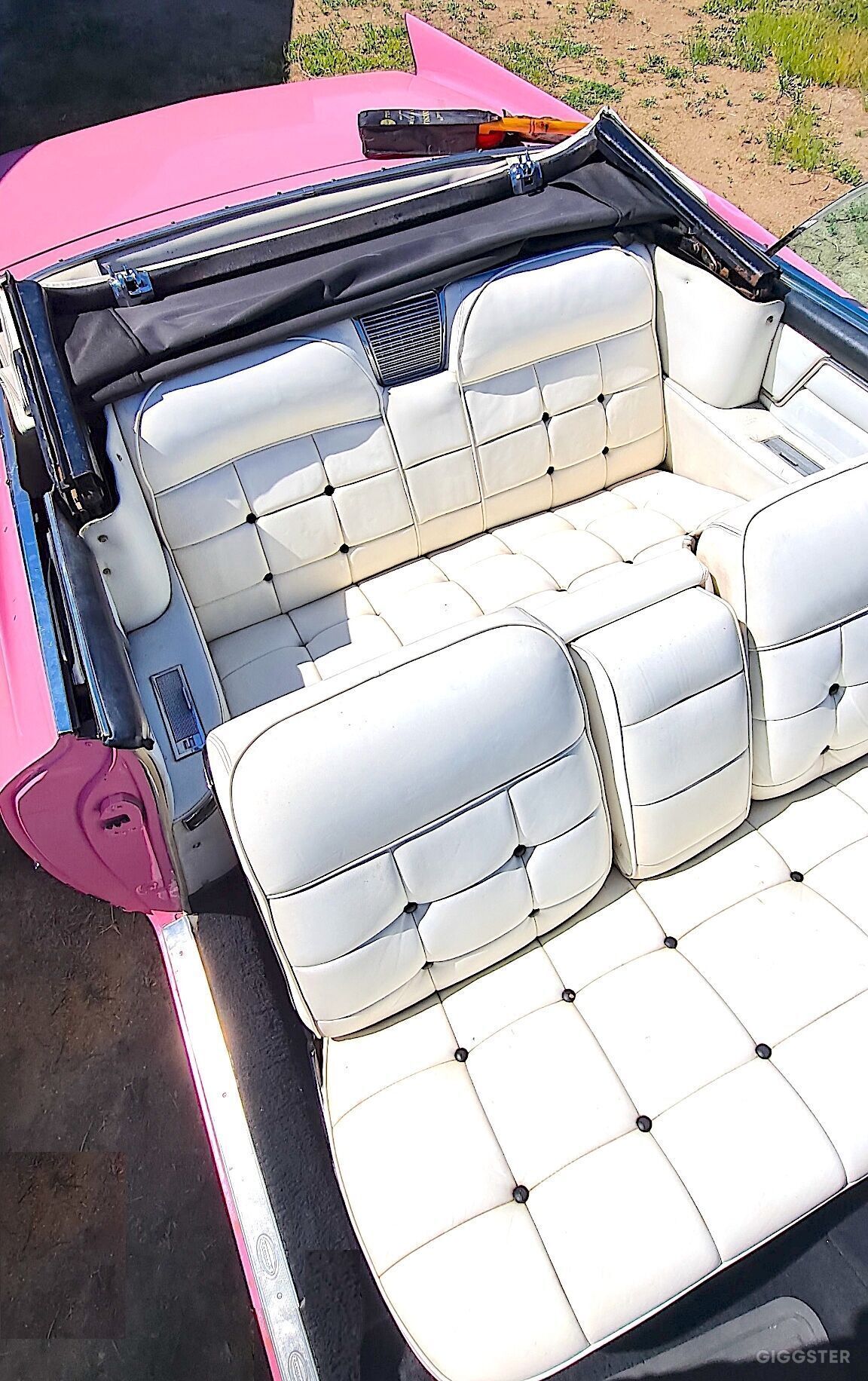 76,014 Classic Pink Convertible Cadillac | Rent this location on Giggster