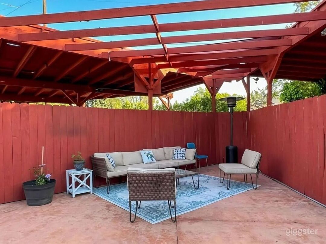Sunny Backyard with Vibrant Artwork | Rent this location on Giggster