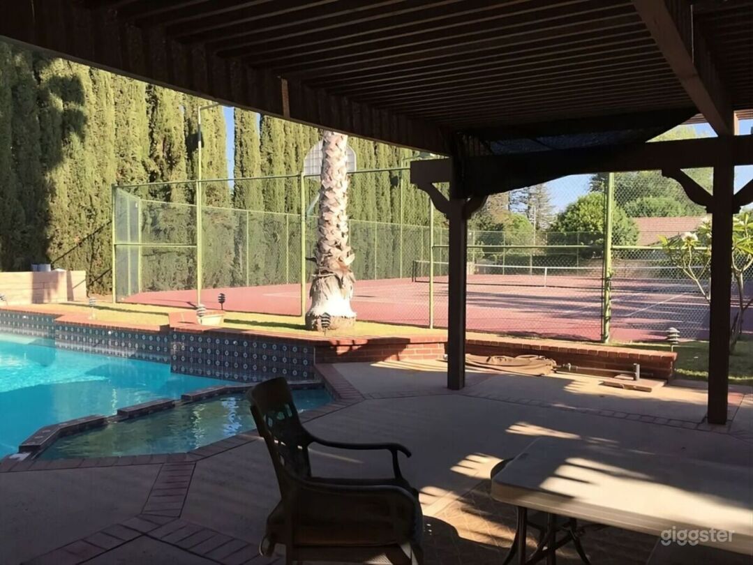 Backyard Poolside & Tennis Court Retreat | Rent this location on Giggster