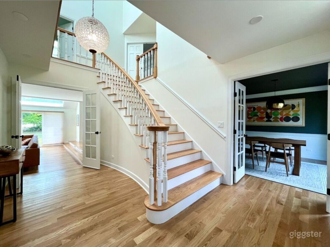 Updated Colonial-Inspired Home With Curved Staircase | Rent this ...