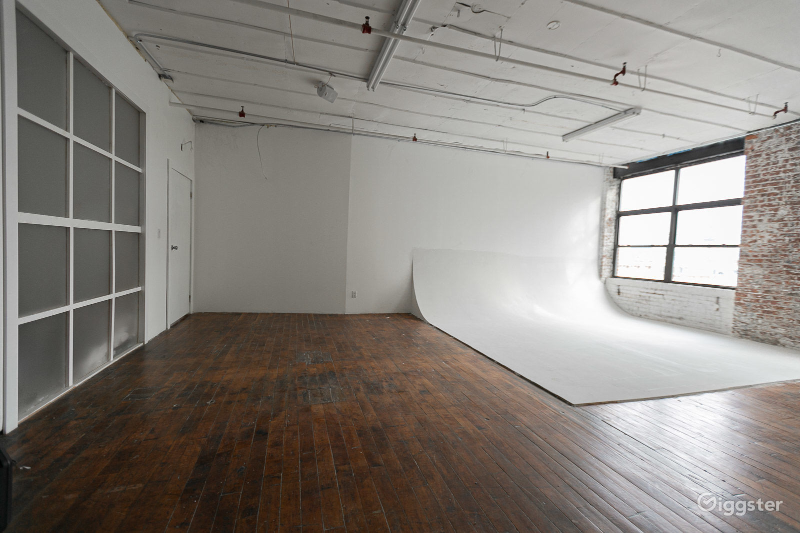 Studio with White Cyclorama Wall | Rent this location on Giggster