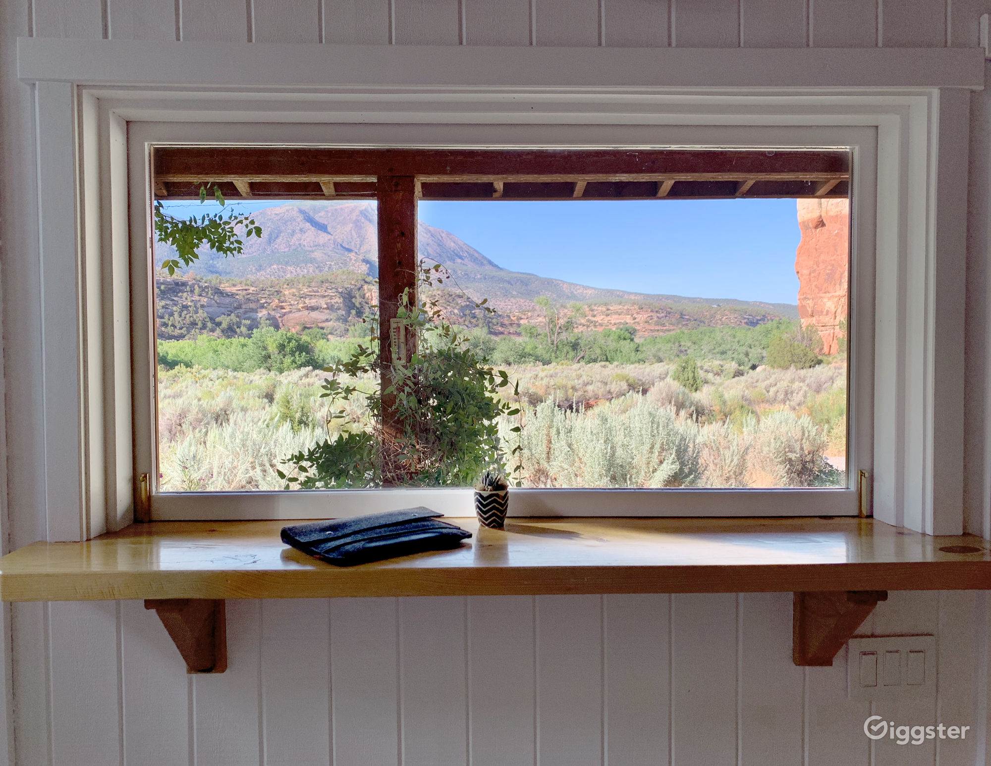 House built into red rock face with sweeping views | Rent this location ...