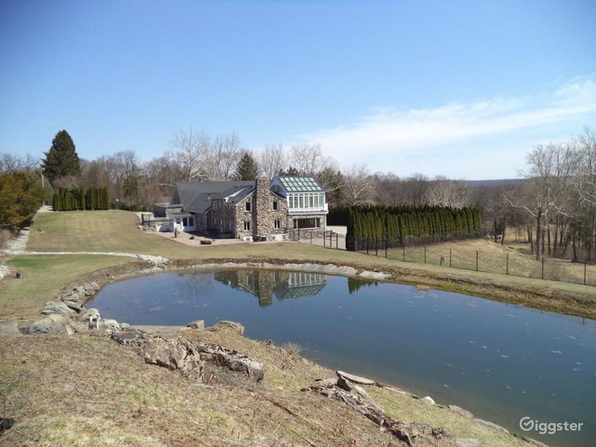 Sprawling, 26 acre pond-front estate | Rent this location on Giggster