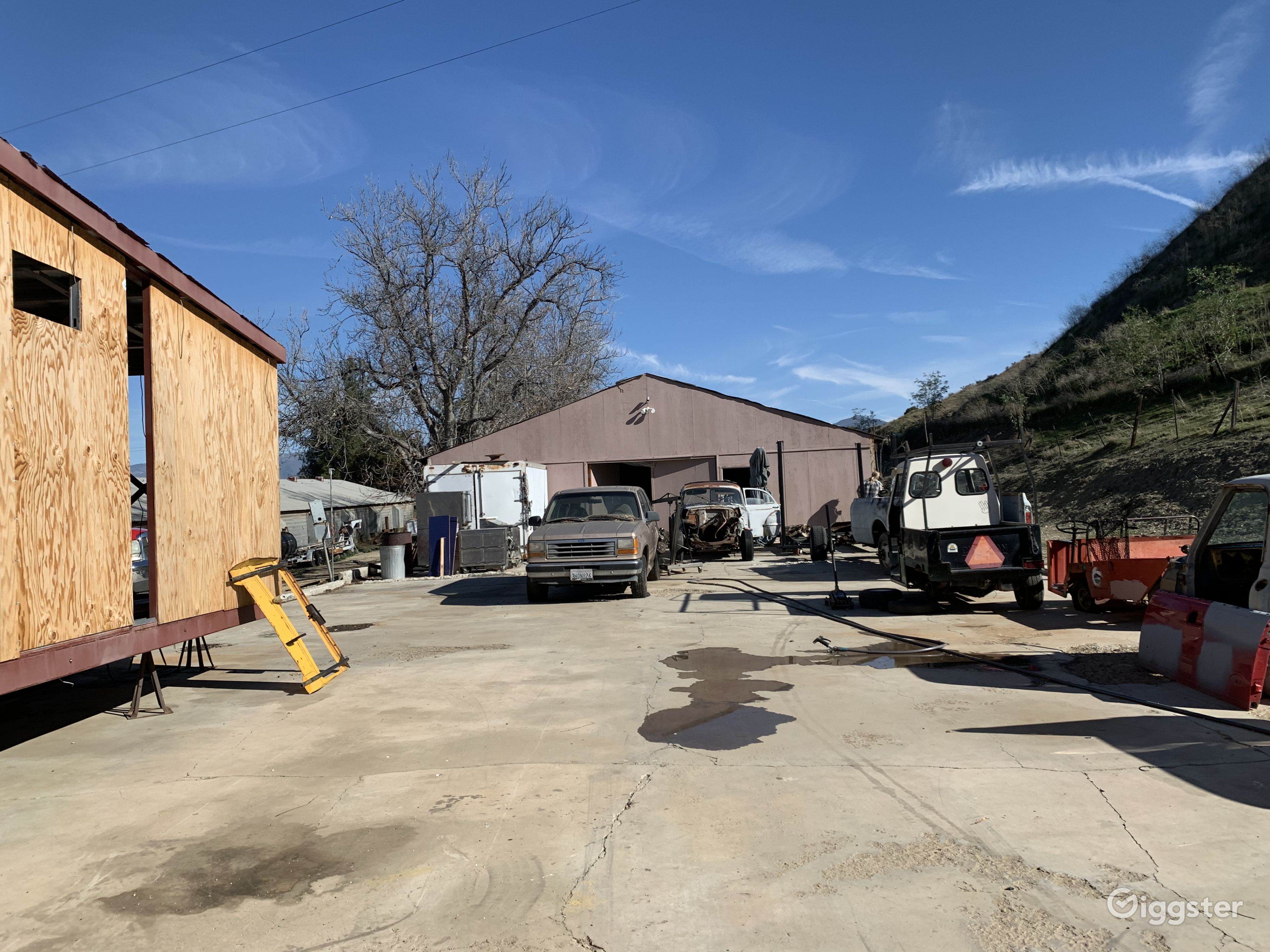 Abandoned cars and mechanic garage at Ranch | Rent this location on ...