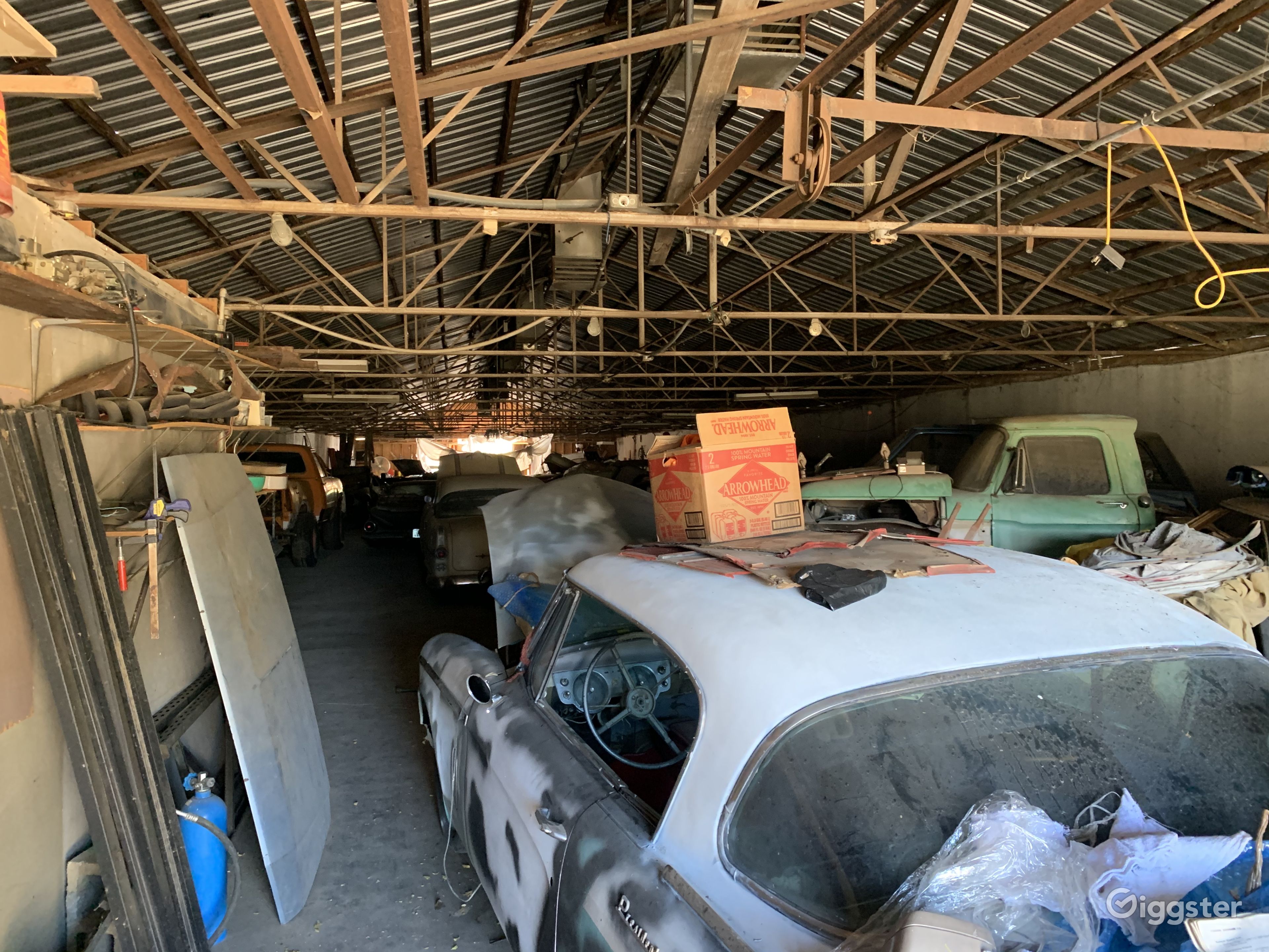 Abandoned cars and mechanic garage at Ranch | Rent this location on ...