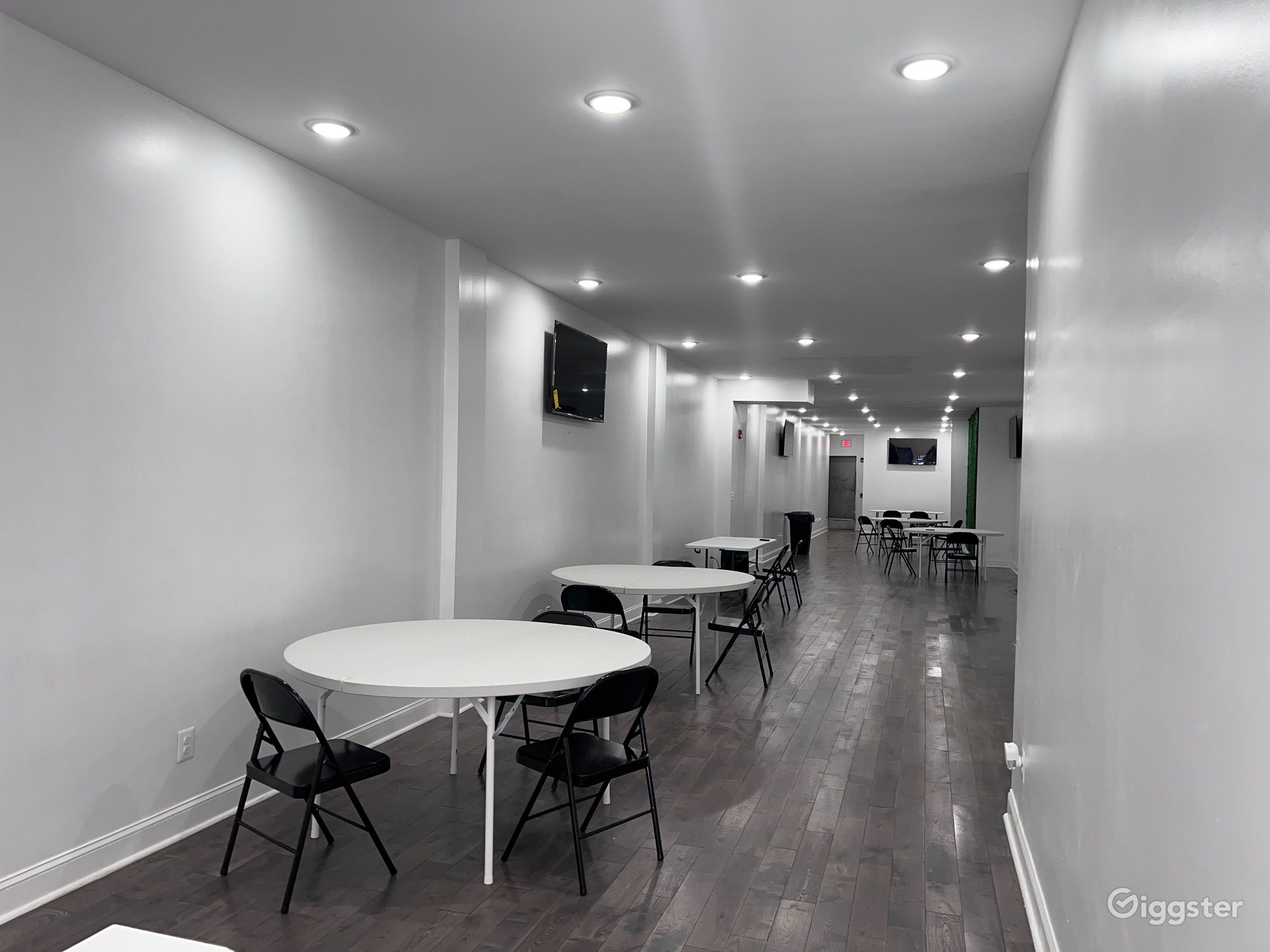 Spacious updated venue with grass wall! | Rent this location on Giggster