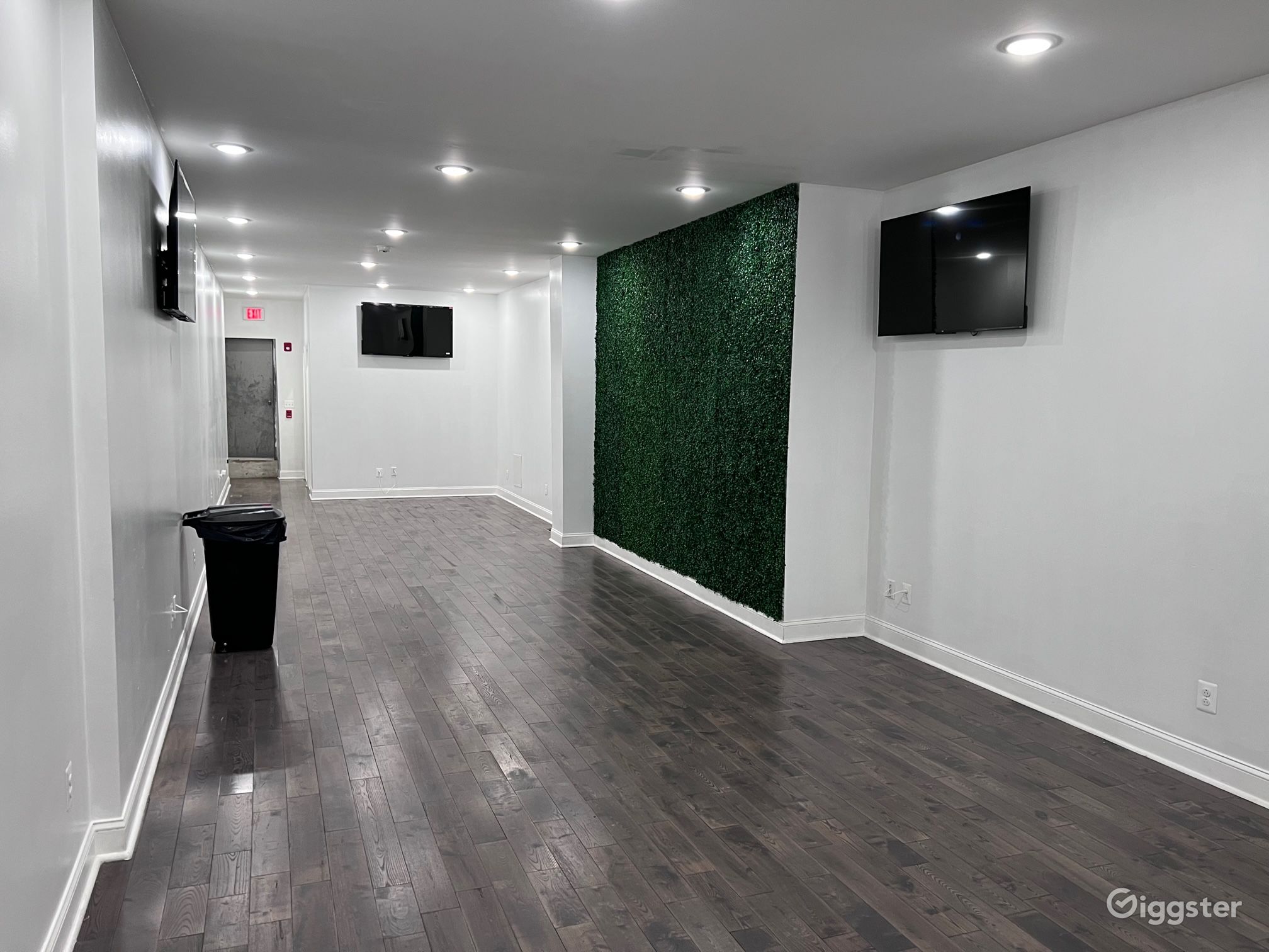 Spacious updated venue with grass wall! | Rent this location on Giggster