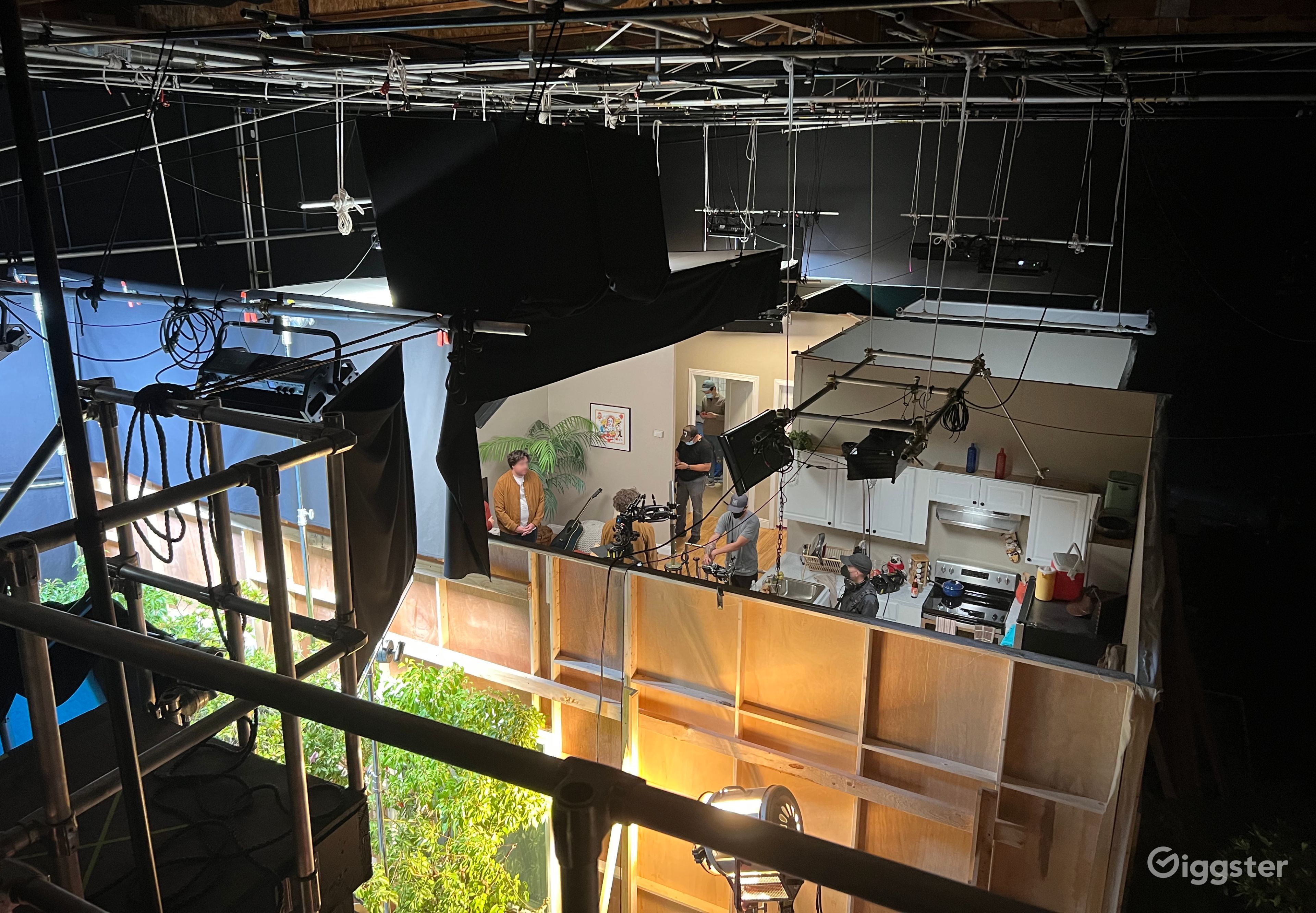 Large Black Void Blackout Stage with Grid | Rent this location on Giggster